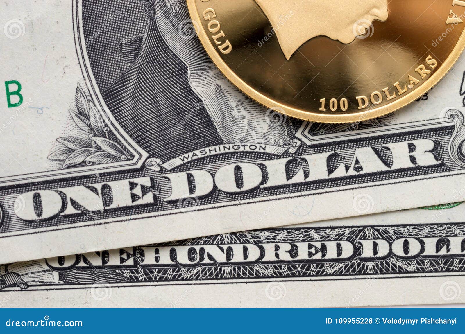 Gold Coin with a Face Value of 100 Dollars and Dollar Bills Stock Photo ...