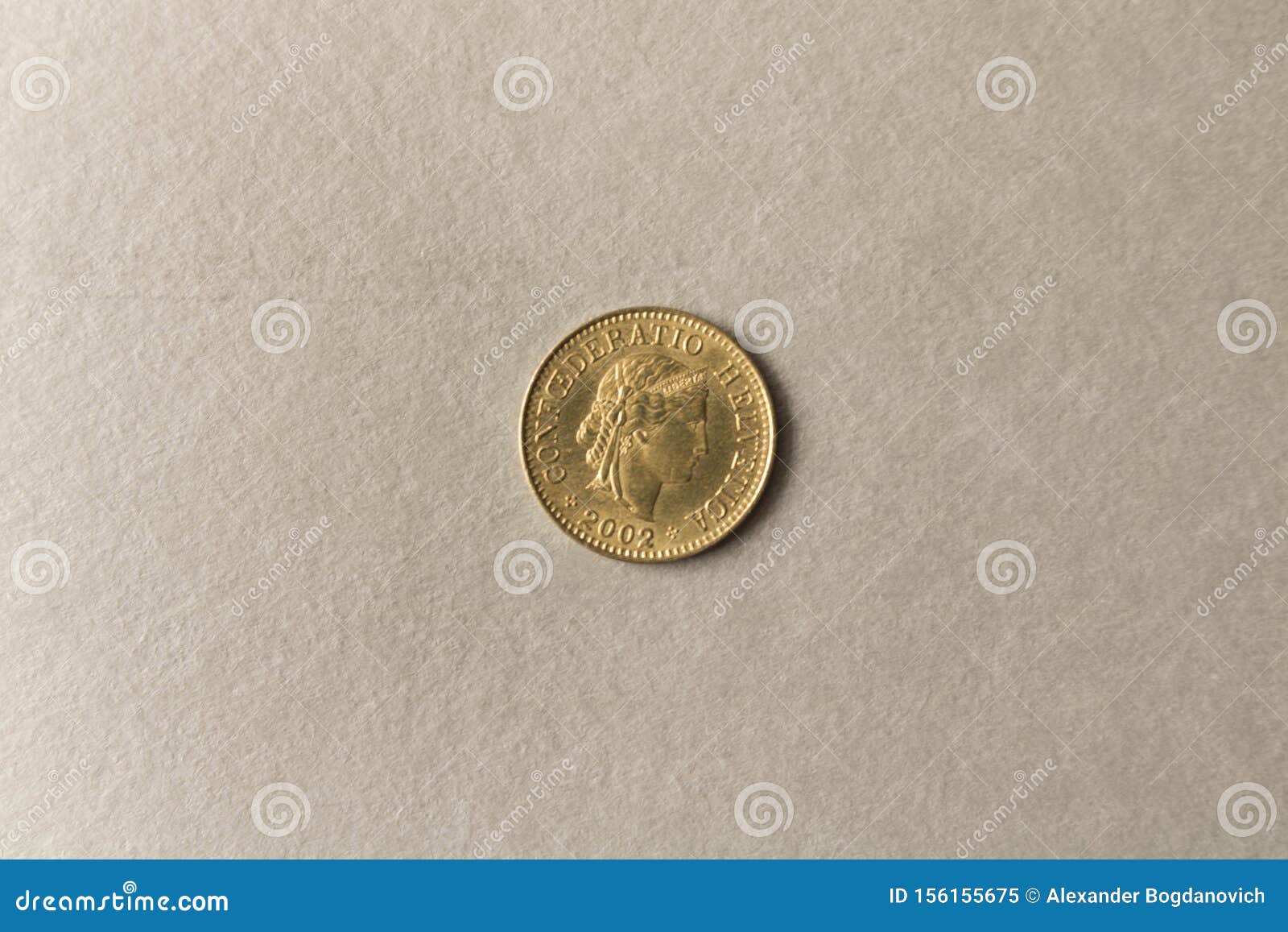 Gold Coin on Grey Background. Close Up Stock Image - Image of gray ...