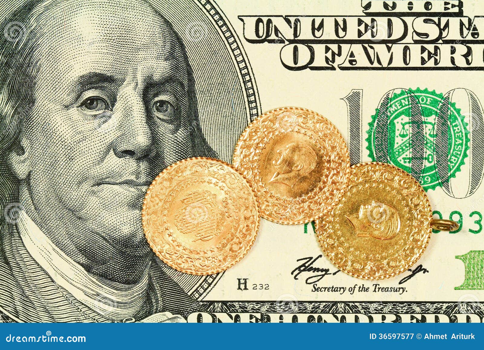 Gold coins on 100 Dollar stock image. Image of economic - 36597577