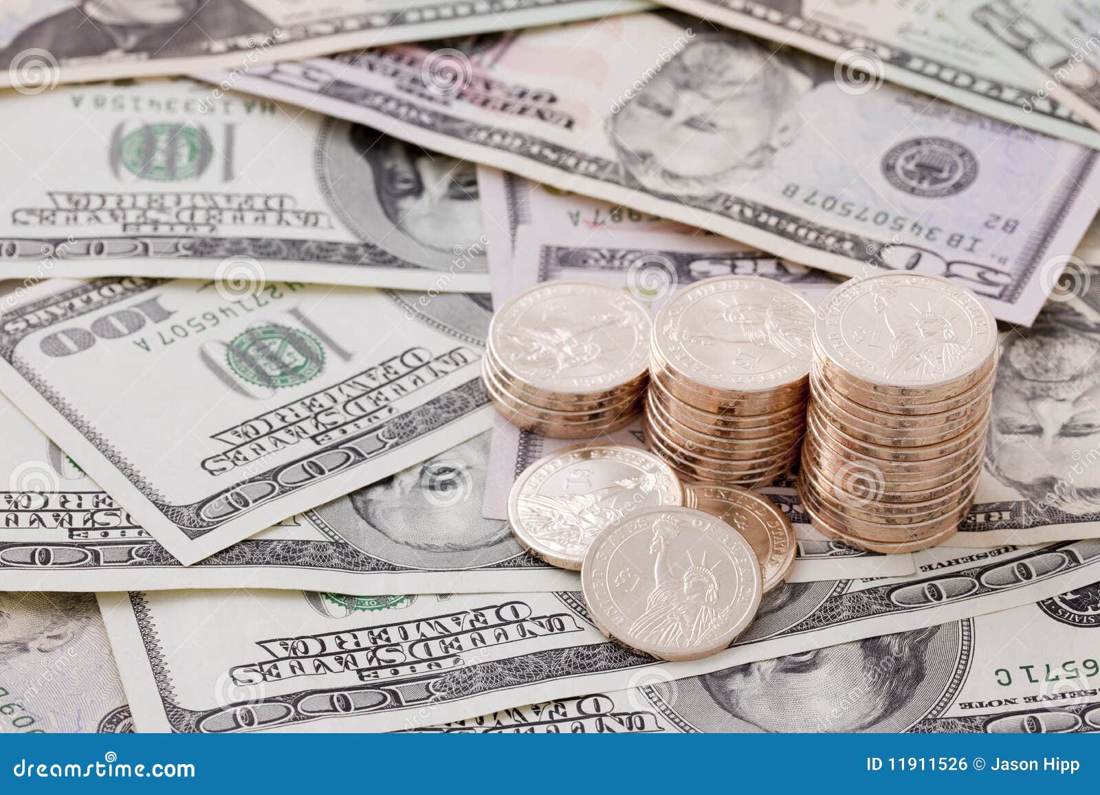 Gold Coins on Dollar Bills stock photo. Image of finance - 11911526