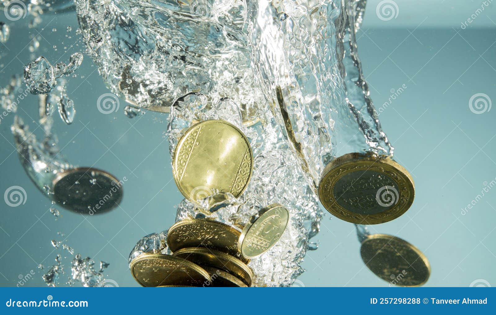 Gold Coins Dropped into Water. Splash of Coins Falling into the Water ...