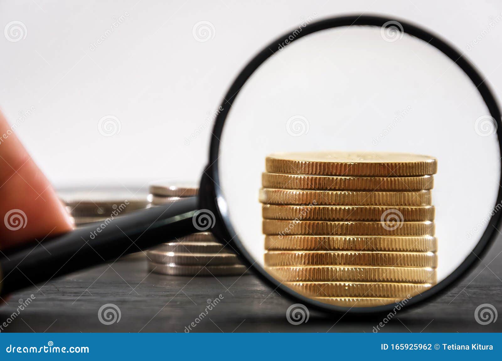 Gold Coins through a Magnifier. Close-up. Stock Photo - Image of ...
