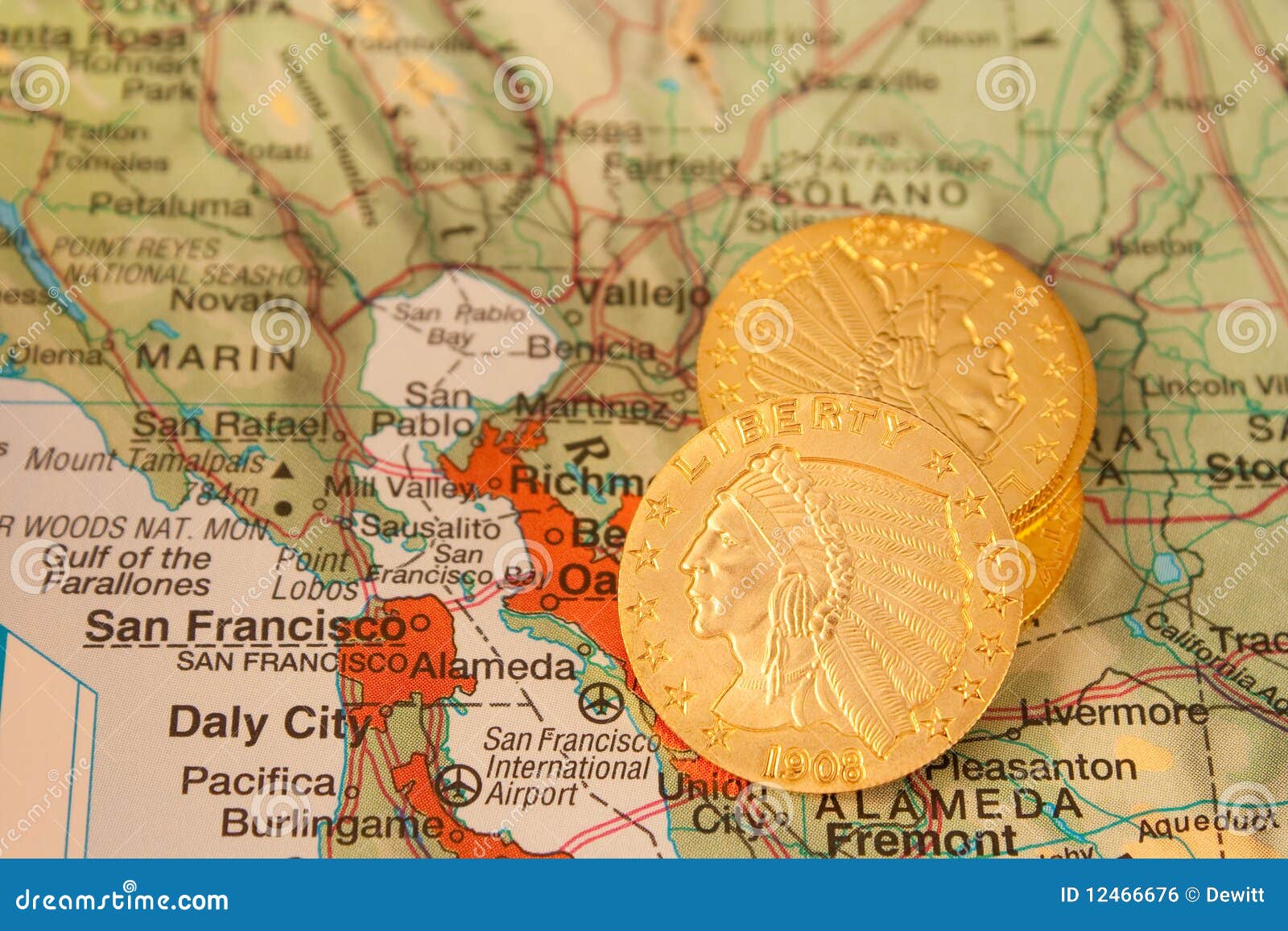Gold coins and map stock photo. Image of earnings, coin - 12466676