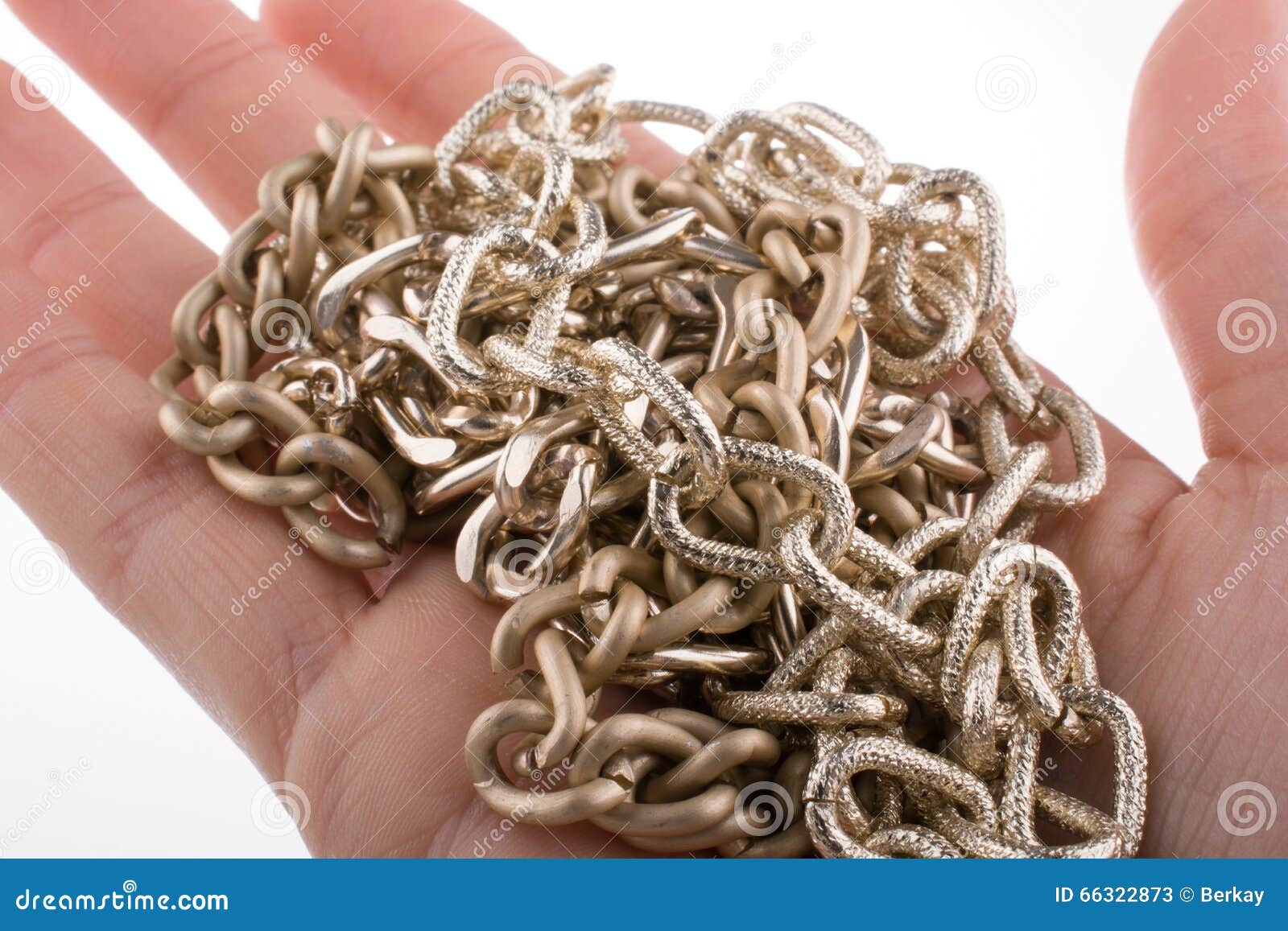 Gold color chain in hand stock image. Image of escape - 66322873