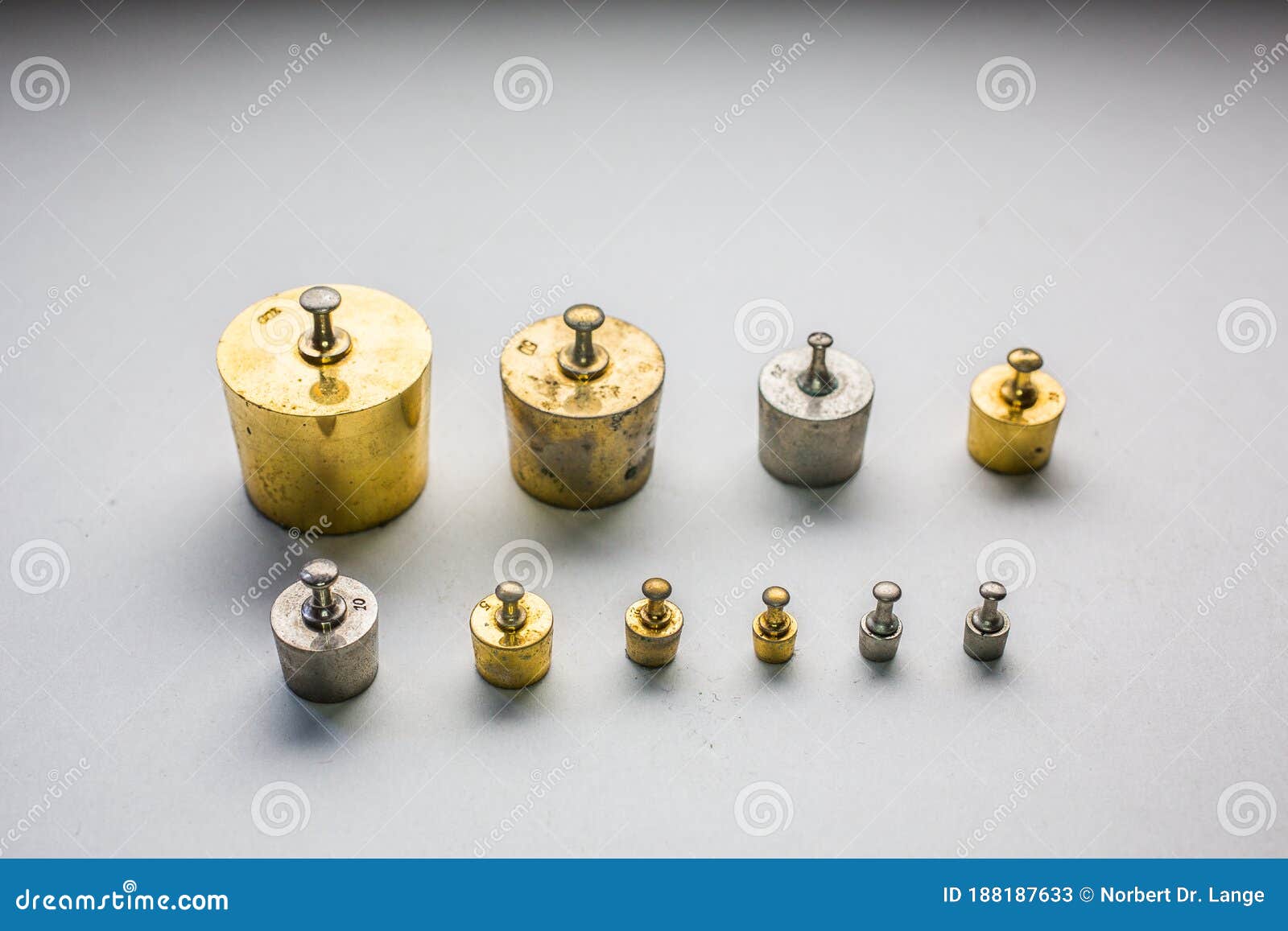 Gold-colored Brass Weight Set Stock Image - Image of brass, weight ...