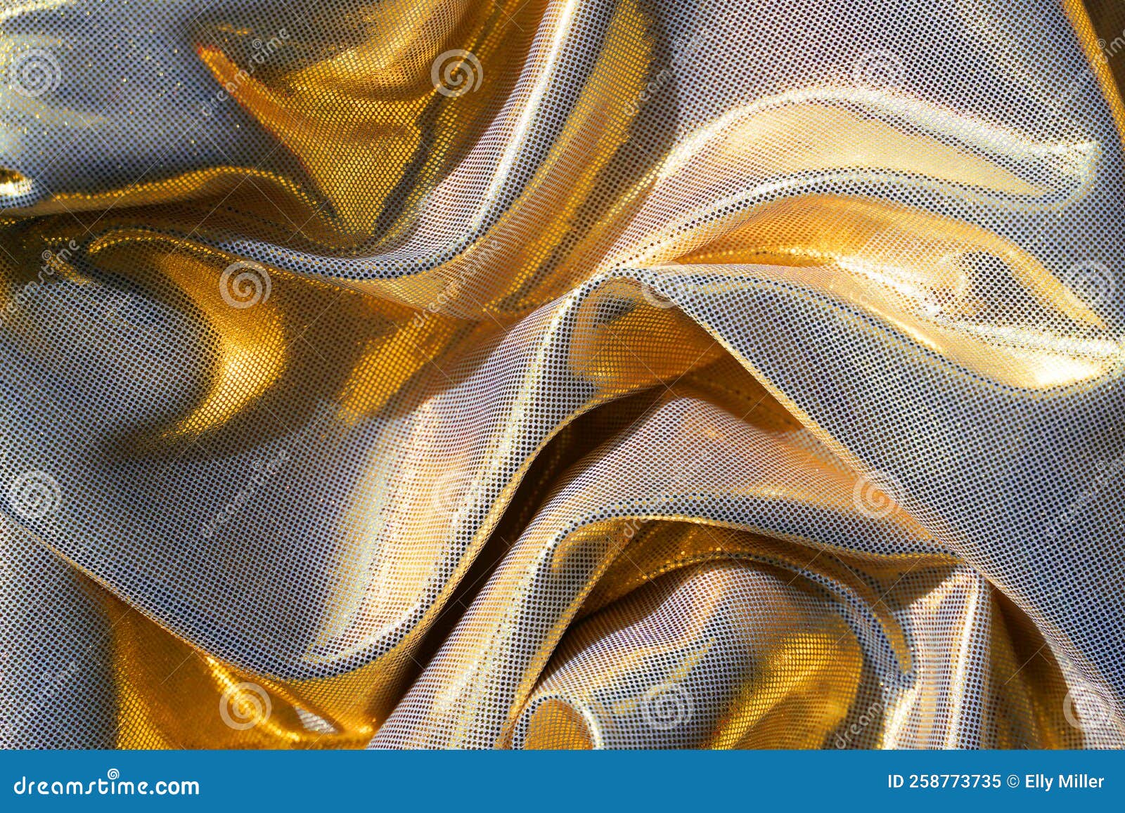 Gold colored fabric. stock image. Image of textile, material - 258773735