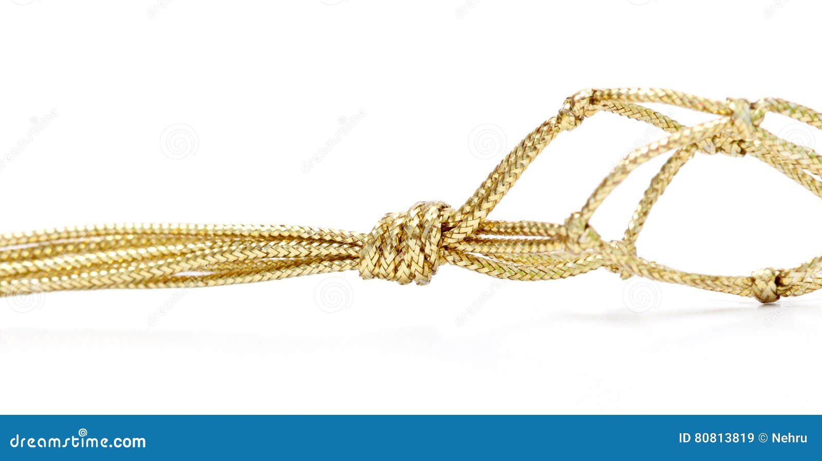 Gold colored rope stock image. Image of classical, fringe - 80813819