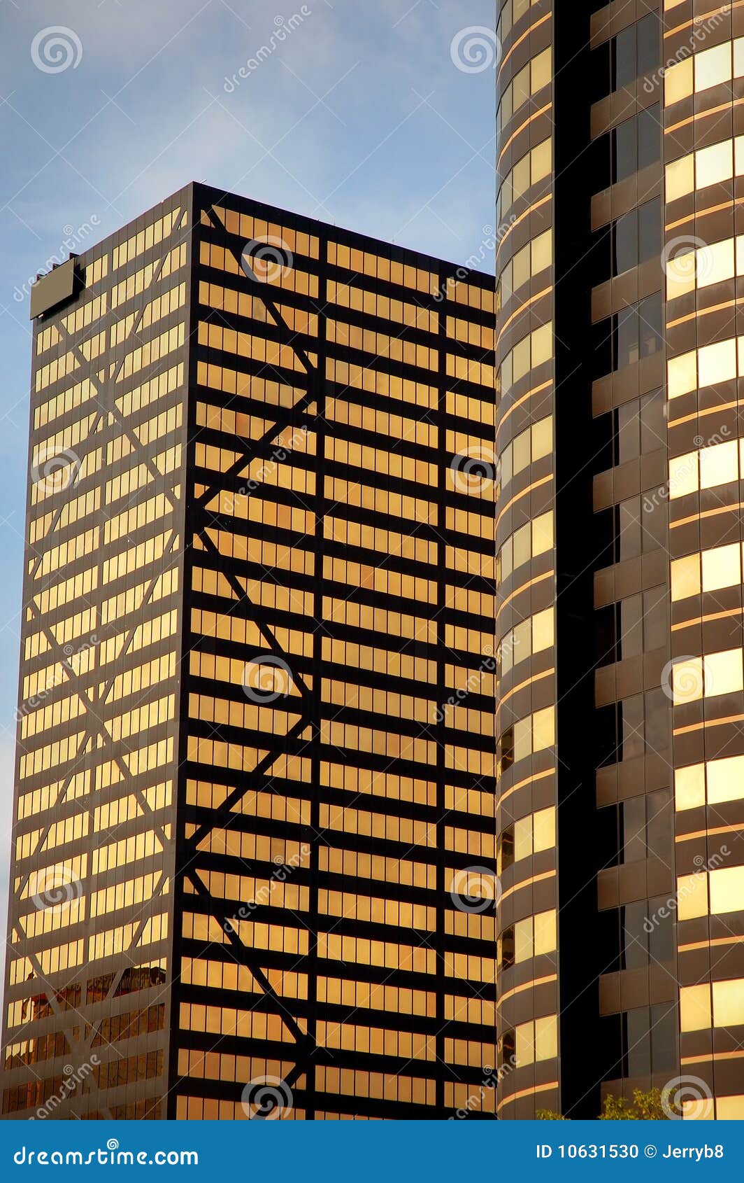 Gold colored skyscrapers stock photo. Image of architectural - 10631530