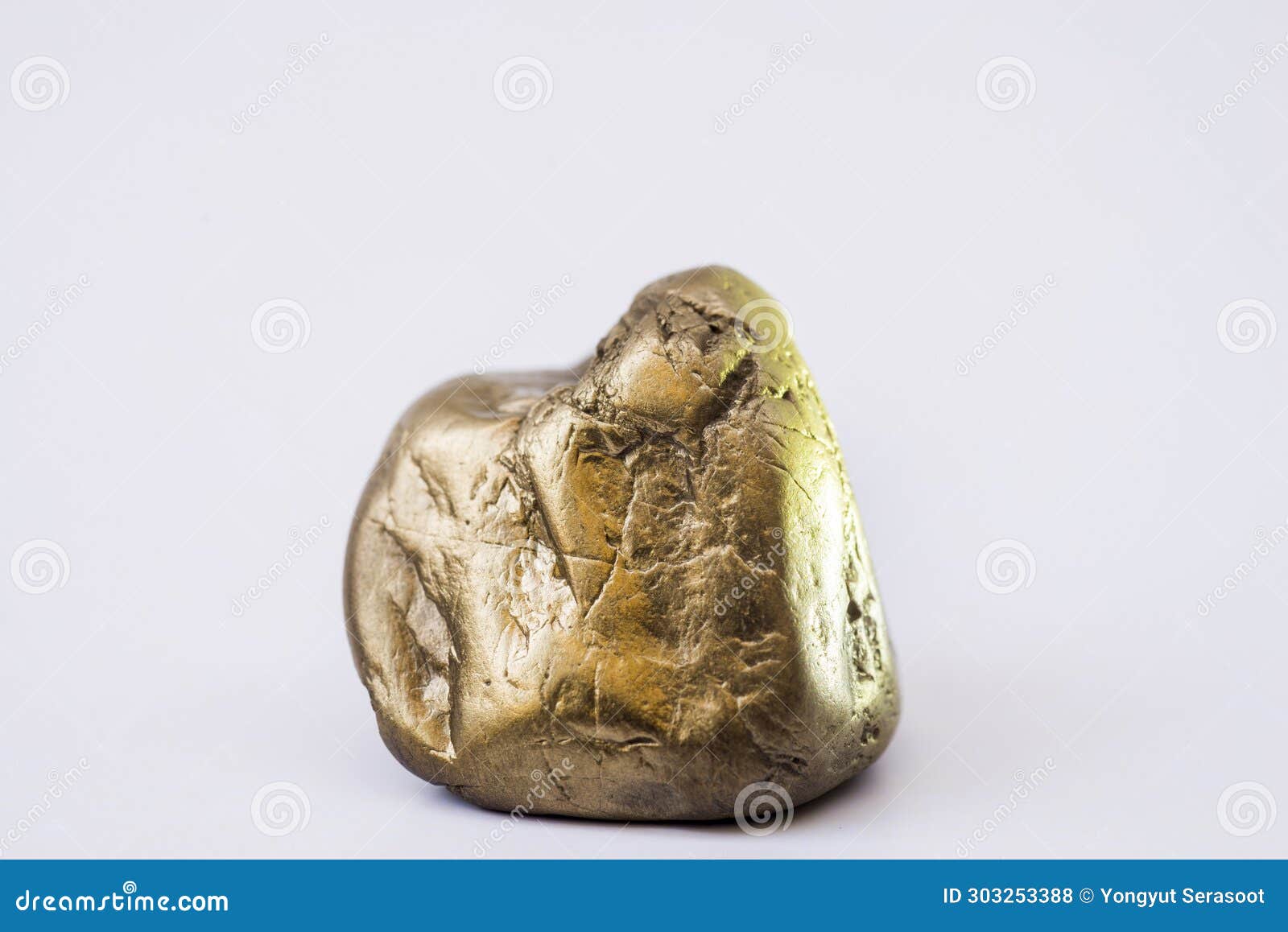 Gold-colored Stones in Natural Shape on a White Background with Stock ...