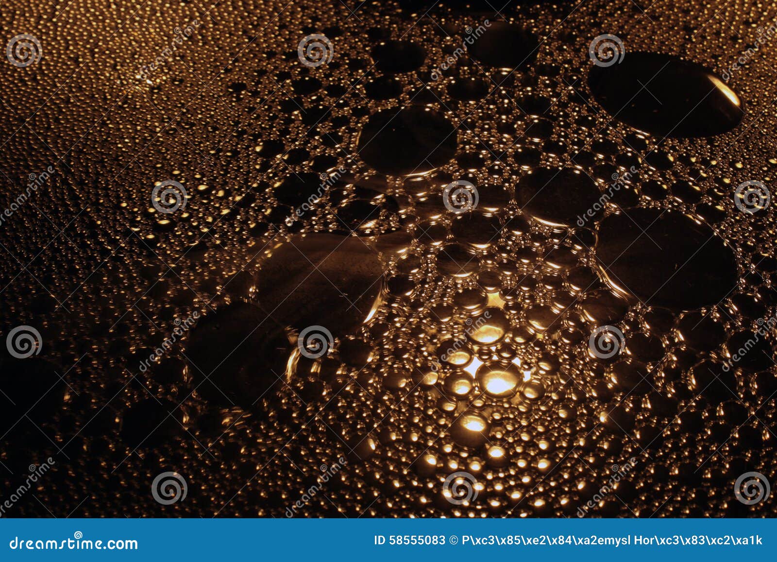 Gold colored water bubble stock image. Image of bubbles - 58555083