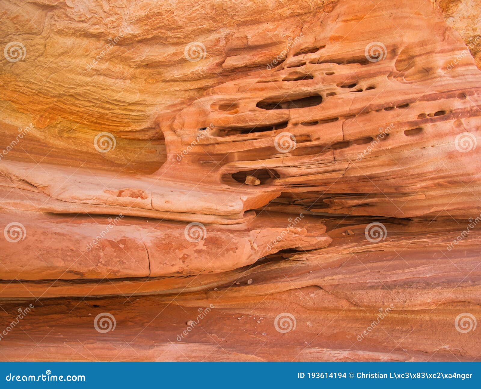 A Gold-coloured Rock Face with Very Small Caves Stock Photo - Image of ...