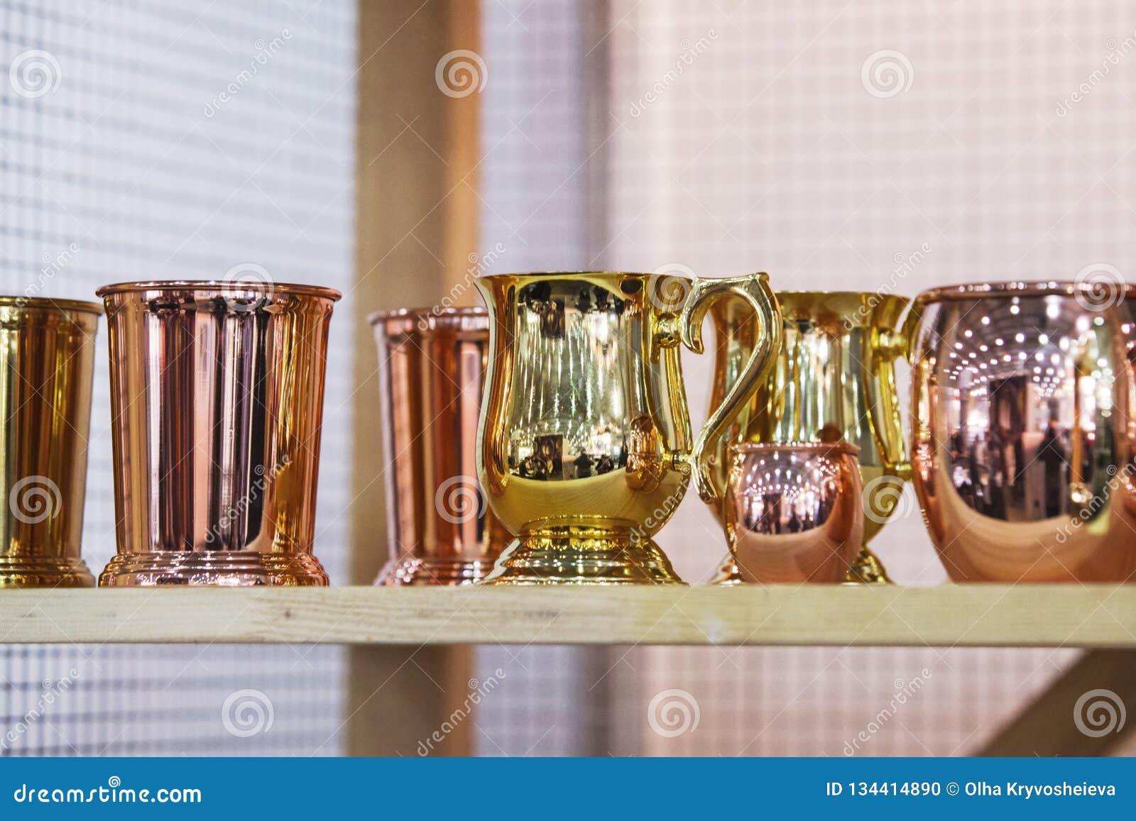 Gold and Copper Glasses and Cookware for Cocktails are at the Bar Stock ...