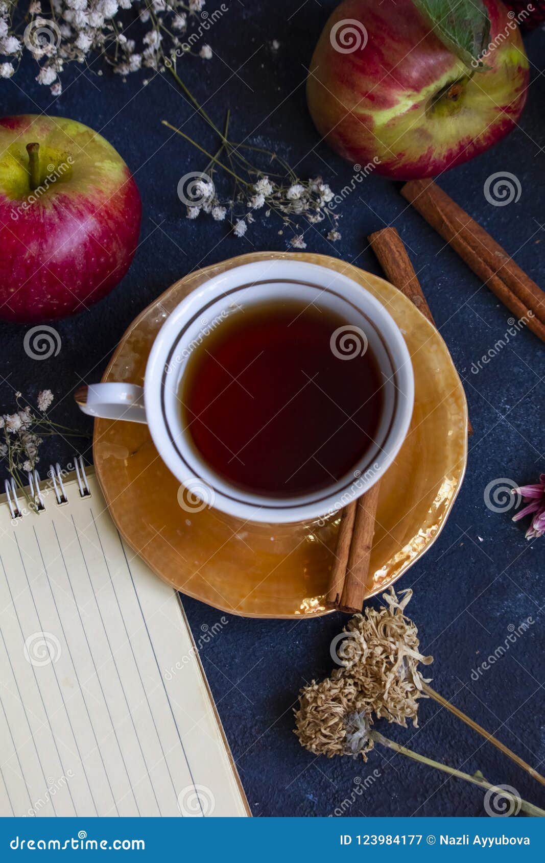 Cup of tea with red apple stock image. Image of fall - 123984177
