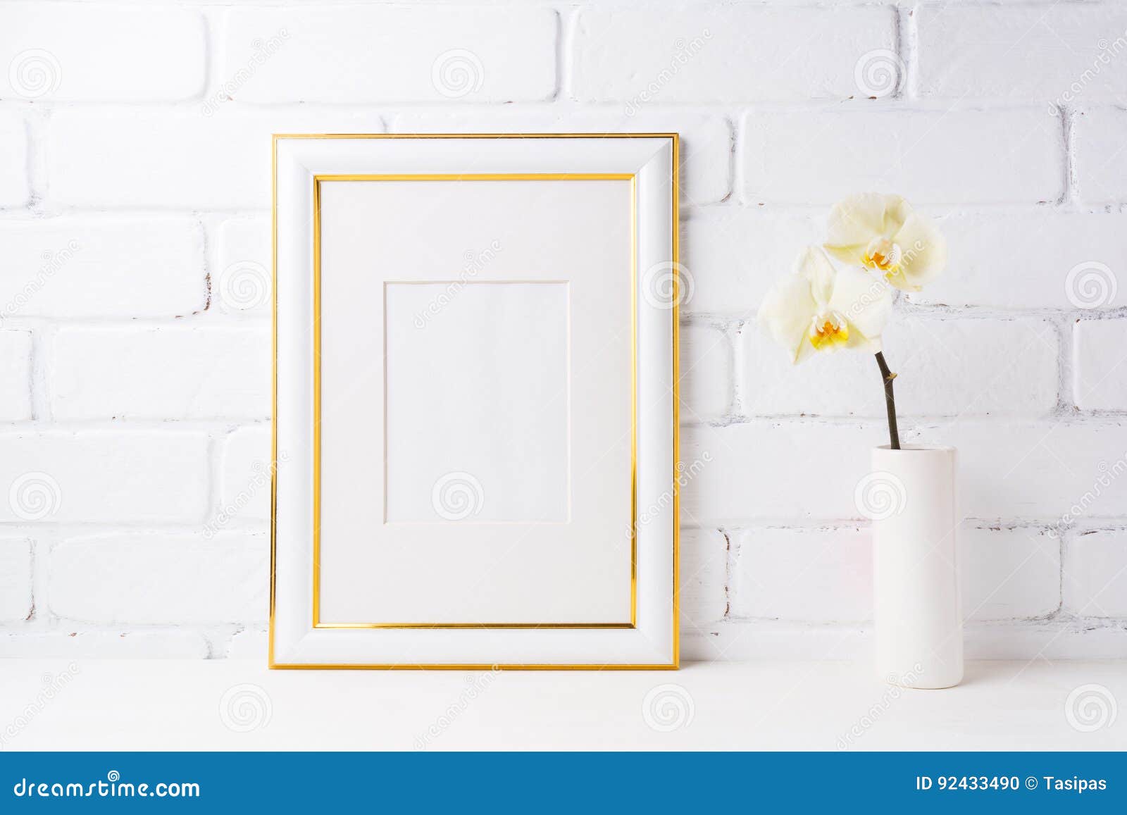 Gold Decorated Frame Mockup with Soft Yellow Orchid in Vase Stock Photo ...
