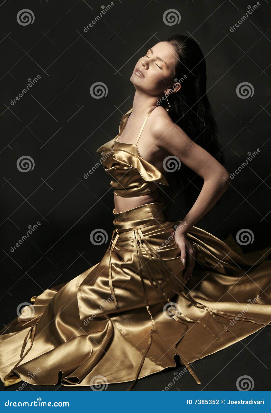 Gold dresses stock photo. Image of luxury, beautiful, girl - 7385352