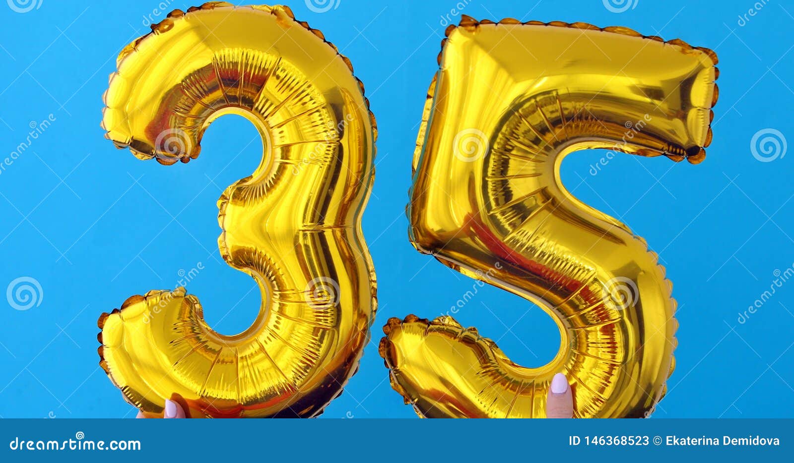 Gold Foil Number 35 Celebration Balloon on a Blue Stock Image - Image ...