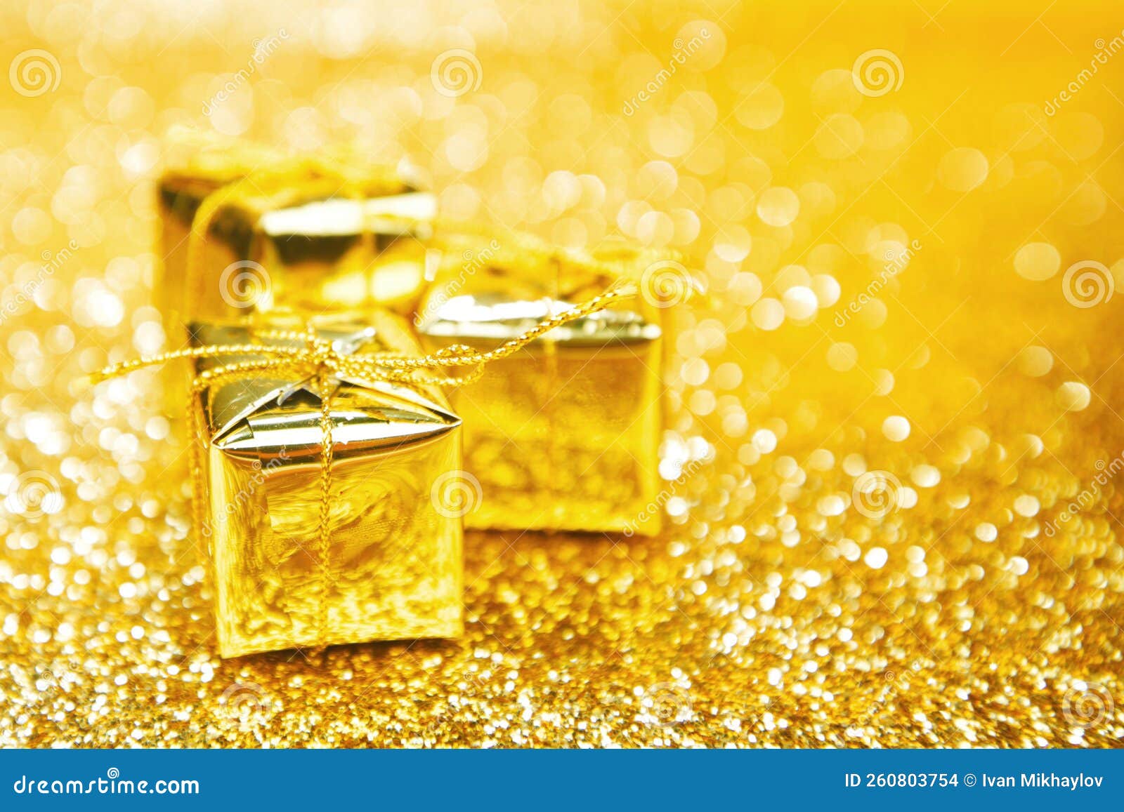 Gold gift boxes stock photo. Image of defocused, blur - 260803754