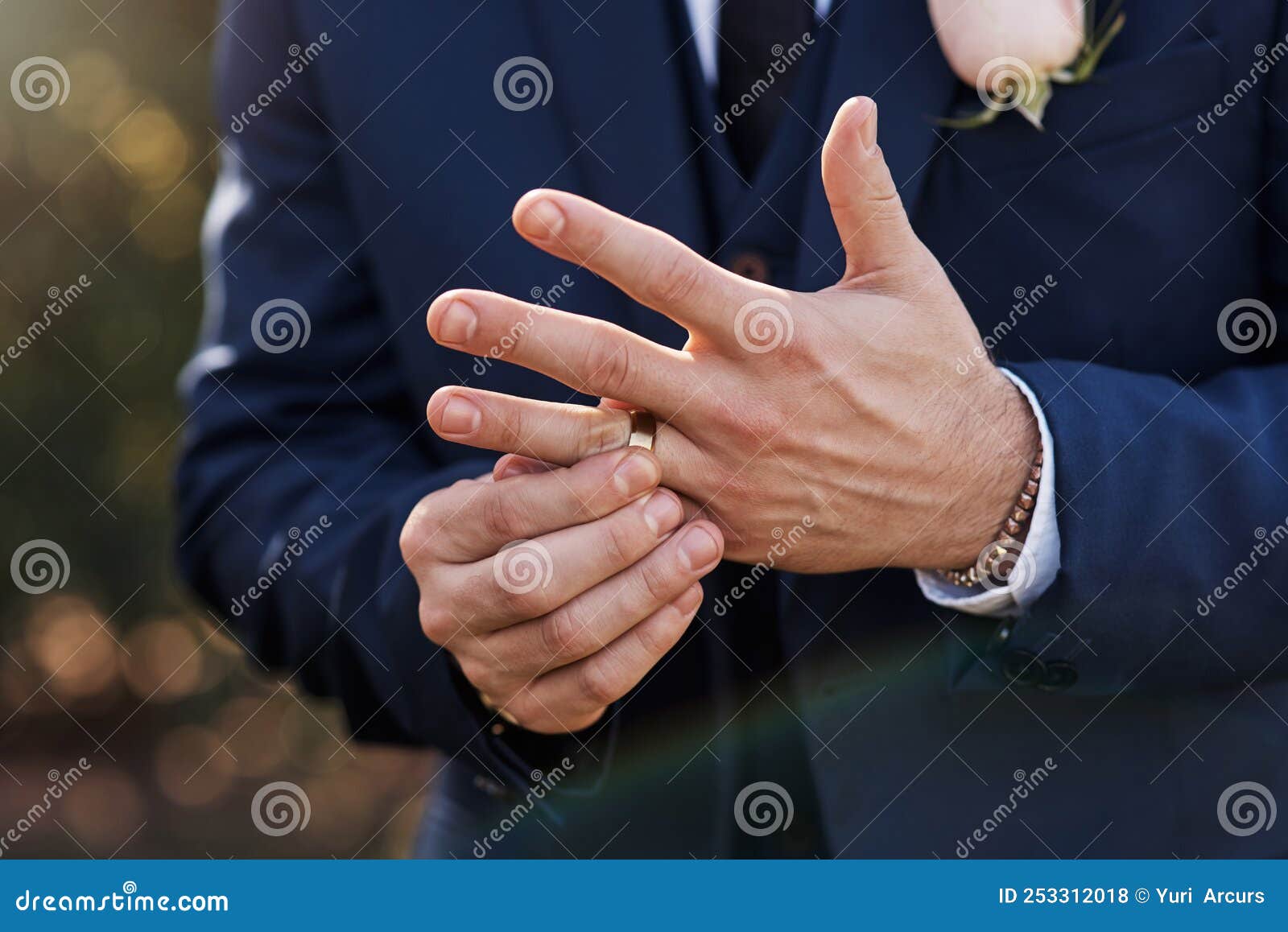 The Gold on His Finger Symbolises Commitment. an Unrecognizable ...