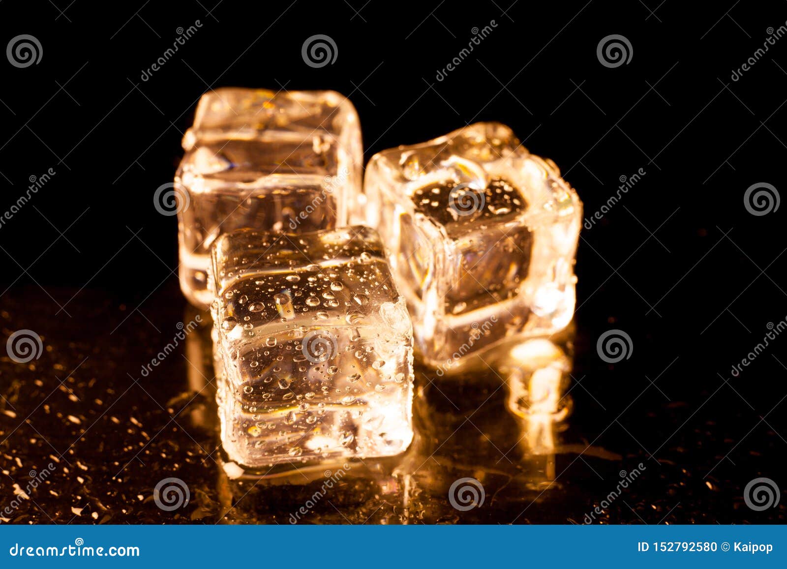 Gold Ice Cubes on Black Background Stock Photo - Image of gold ...