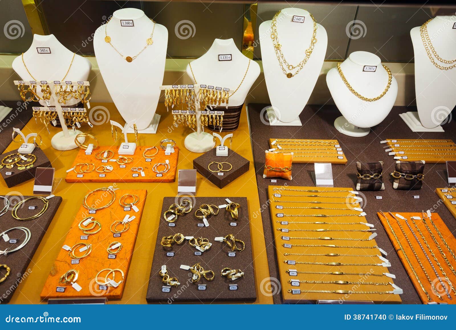 Gold jewelry at showcase stock photo. Image of fashion - 38741740