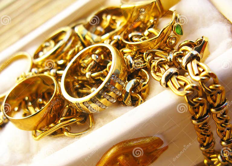 Gold jewels stock image. Image of rings, white, jewels - 12233249