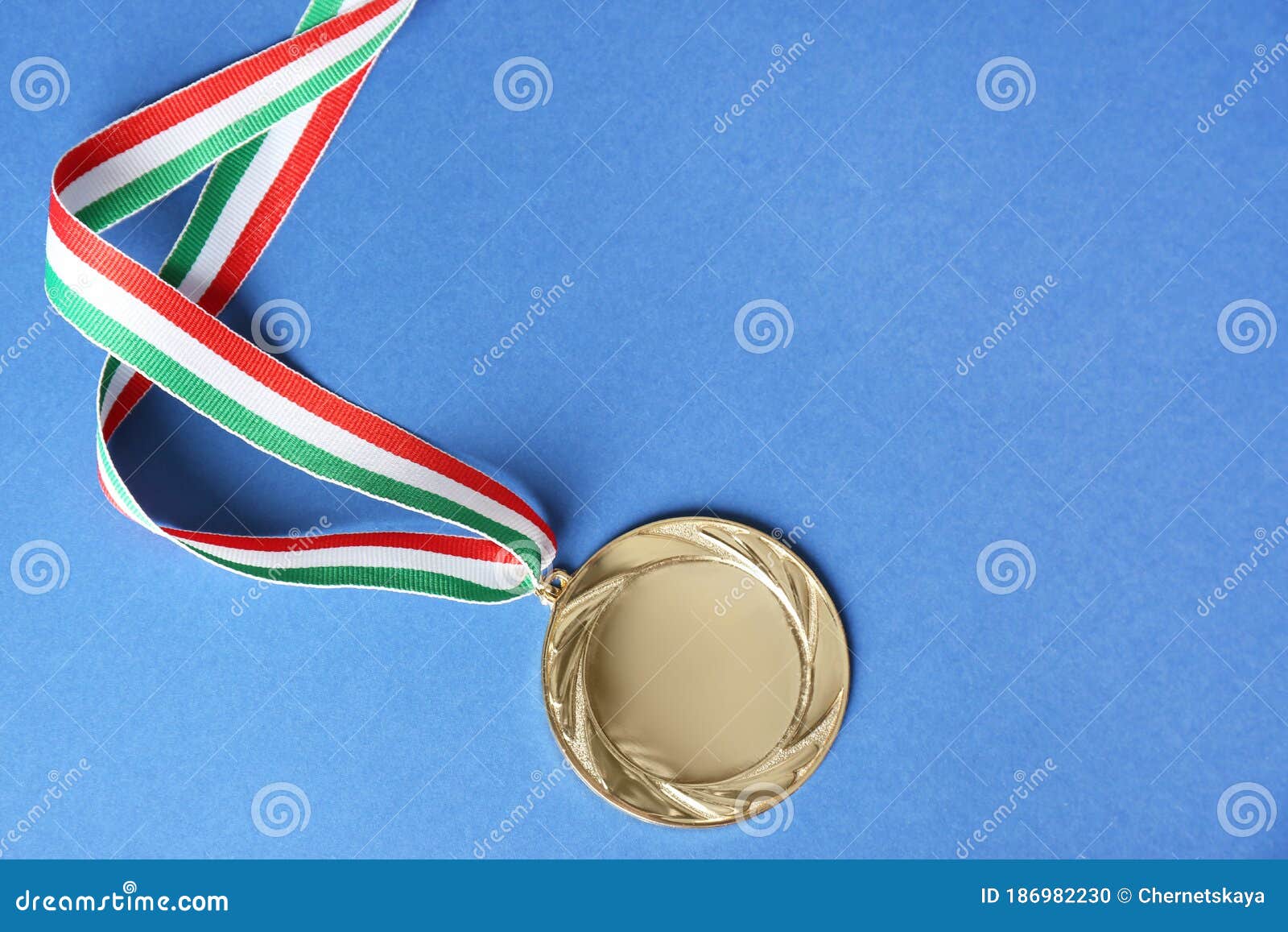 Gold Medal on Blue Background. Space for Design Stock Photo - Image of ...