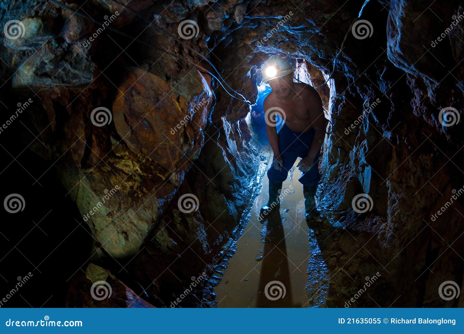 Small Scale Gold Miner Walks through Inside a Tight Mining Tunnel ...