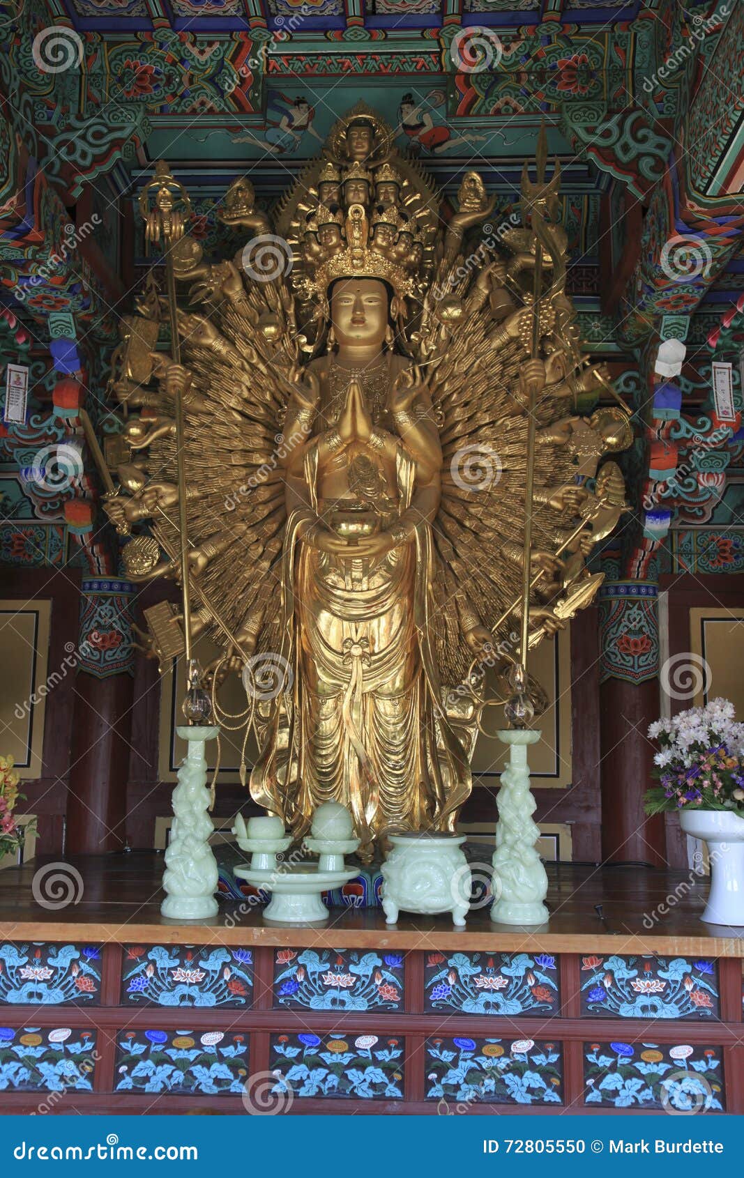 Gold multi armed buddha stock photo. Image of statue - 72805550