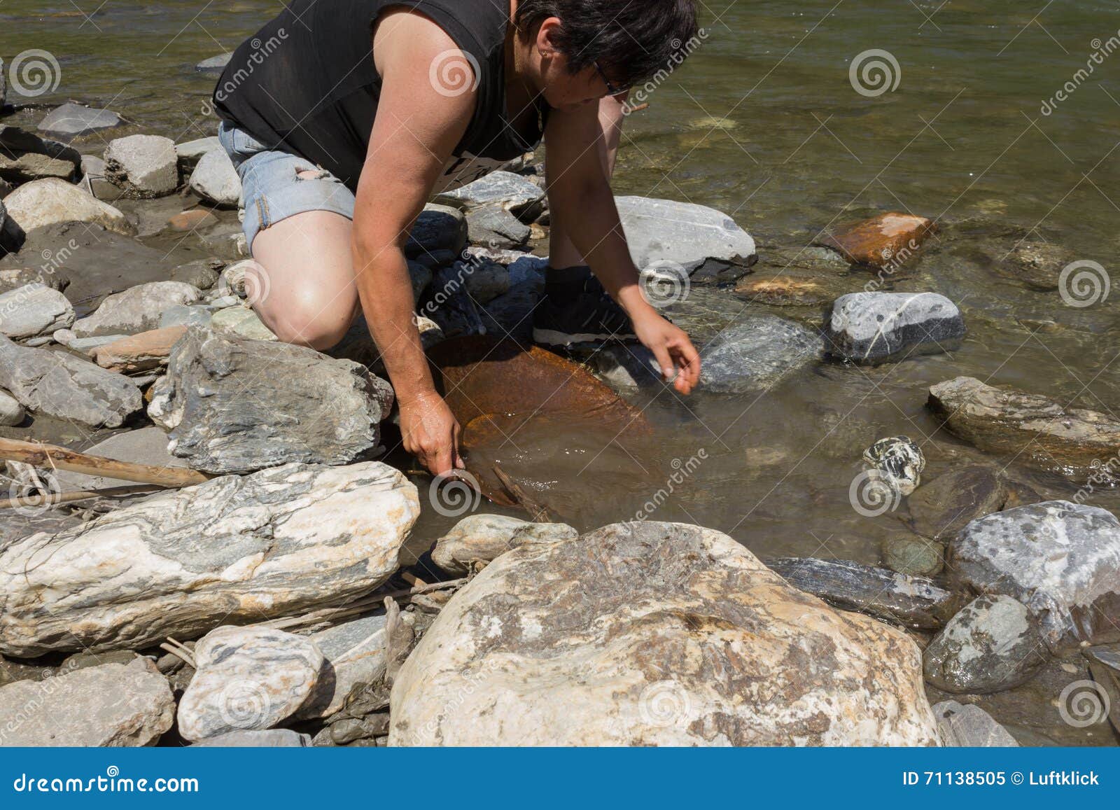 Gold Nugget Mining from the River Stock Image - Image of searching ...