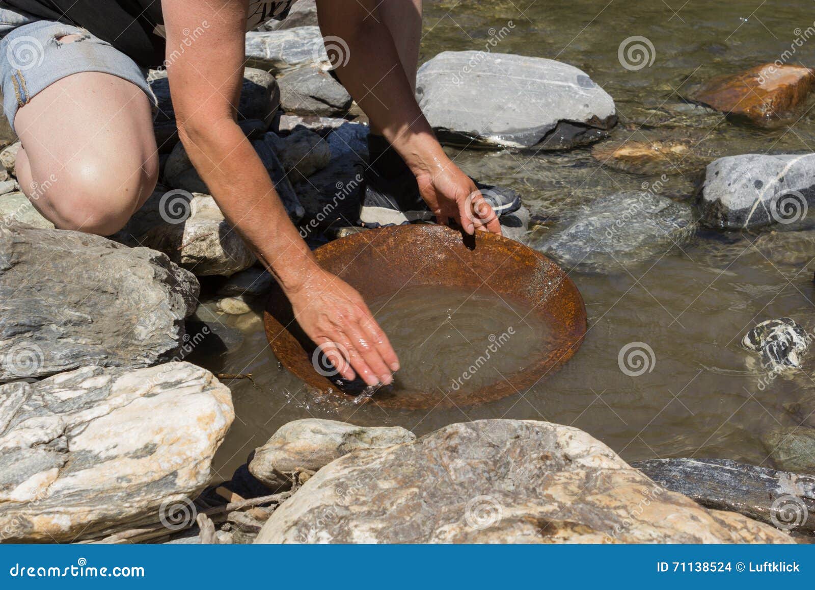 Gold Nugget Mining from the River Stock Photo - Image of goldpan ...