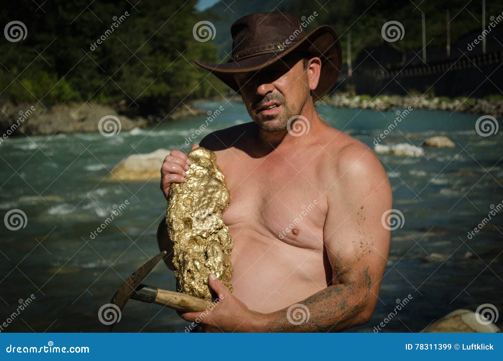 Gold miner, with nugget. stock image. Image of people - 78311399