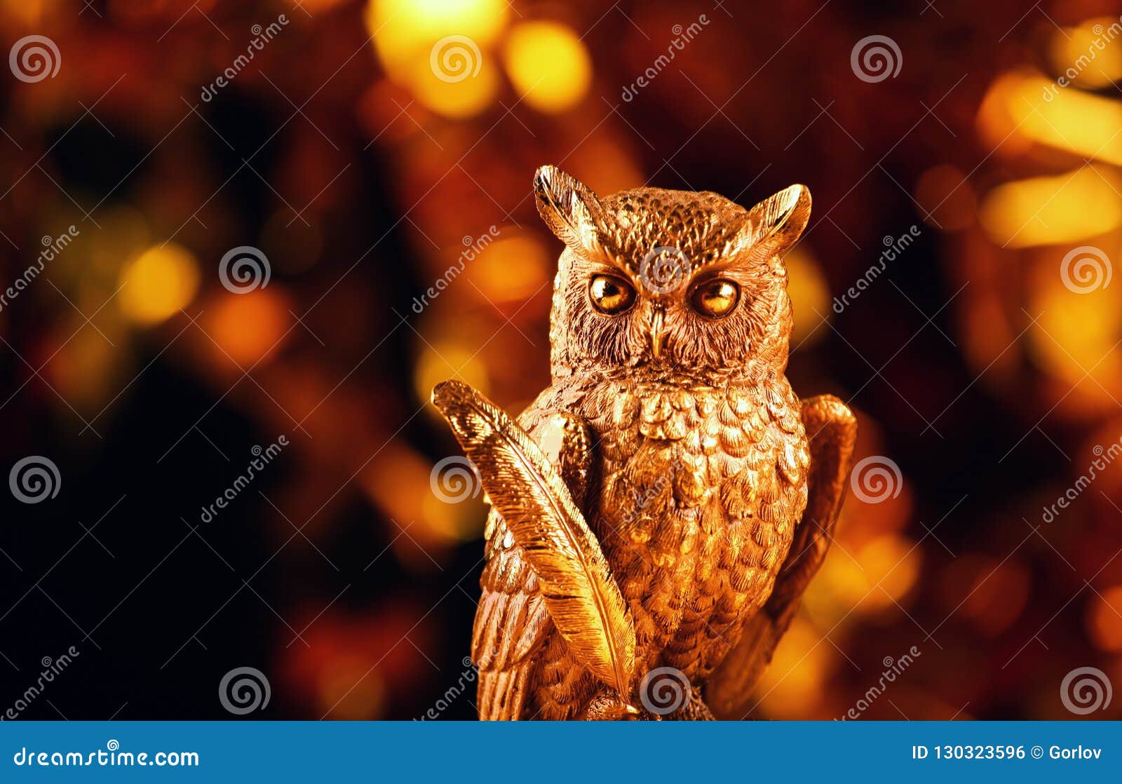 Gold owl figure studio stock photo. Image of design - 130323596