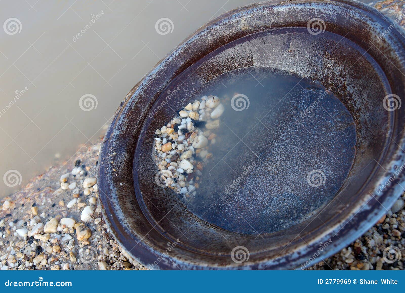 Gold pan stock image. Image of gravel, stream, miner, rich - 2779969
