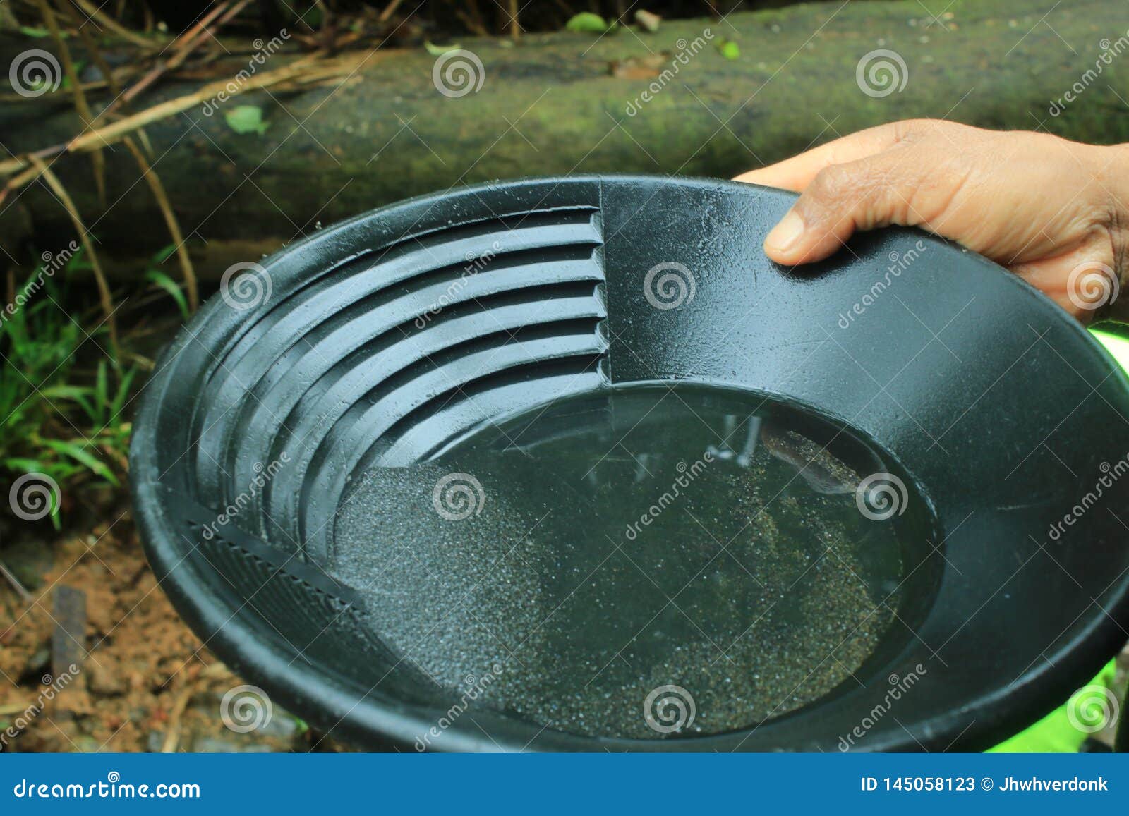Gold Pan Full of Black Sand, Under Which the Gold Nuggets are Buried ...
