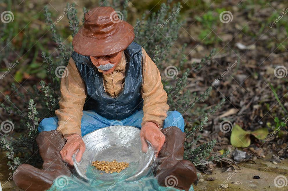 Gold panner stock image. Image of panning, grains, statue - 65963657