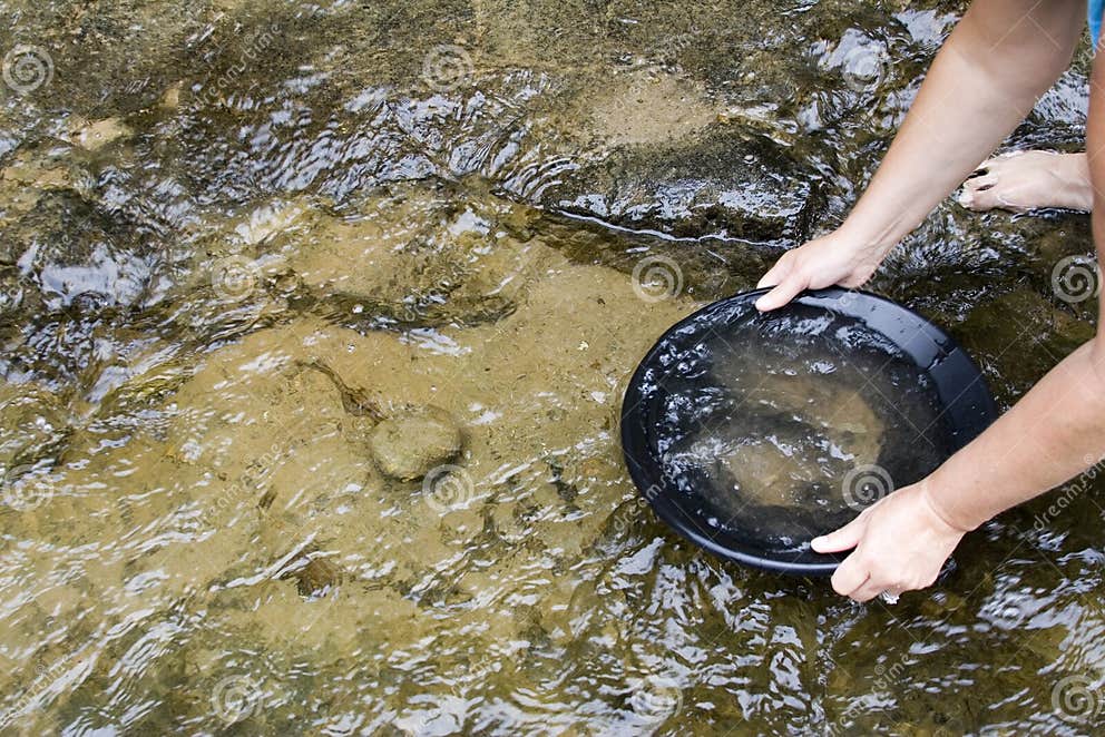 Gold panning for gold stock photo. Image of hand, geology - 1122580