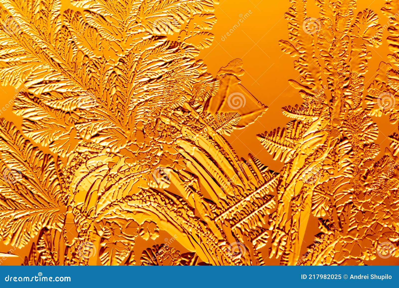 Gold Patterns from Frost on Glass As a Background. Stock Image - Image ...