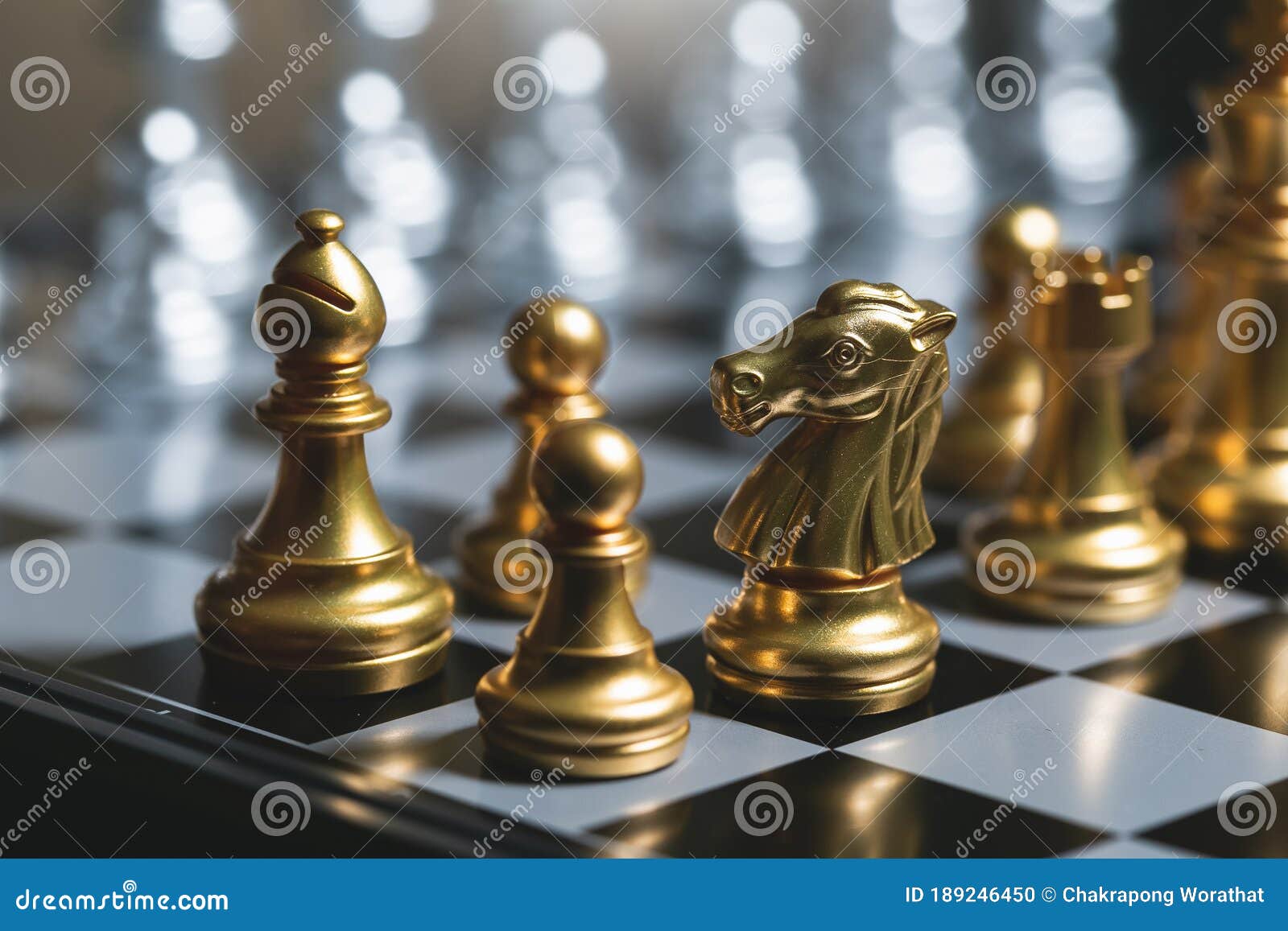 Gold Pawn Surrounded by Gold Chess Pieces on a Chess Board Stock Photo ...