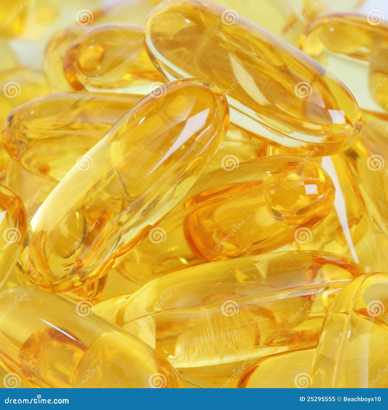 Gold pills stock image. Image of dose, macro, liquid - 25295555