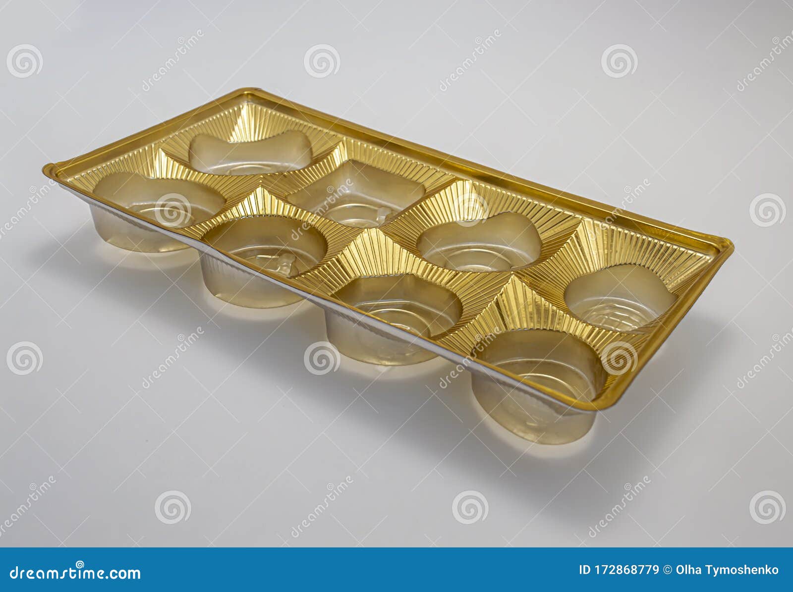 Gold Plastic Packaging for Chocolates Close Up Stock Image - Image of ...