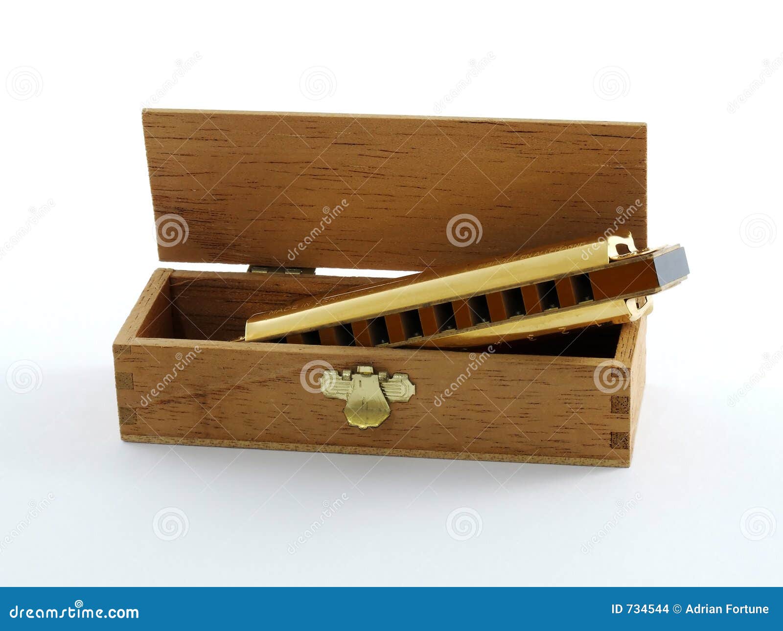 Gold Plated Harmonica in Box Stock Photo - Image of gold, harp: 734544