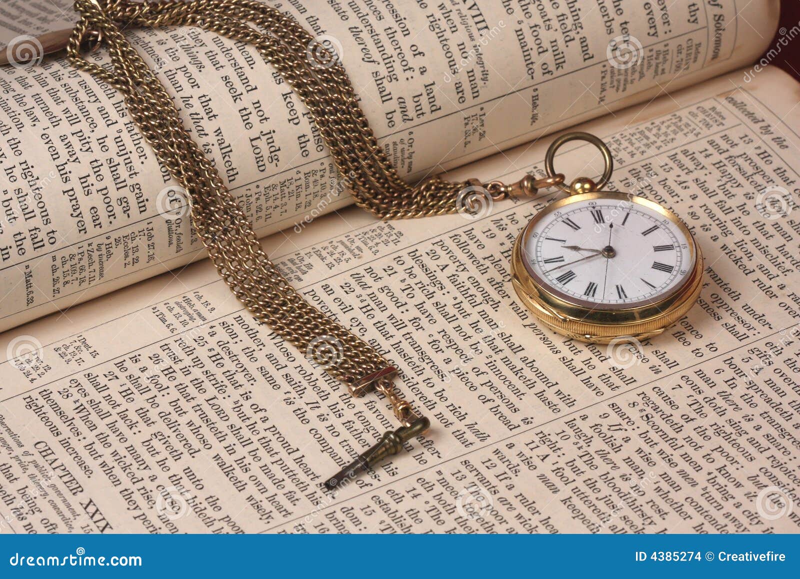 Gold Pocket Watch on Old Bible Stock Photo - Image of antique, retro ...