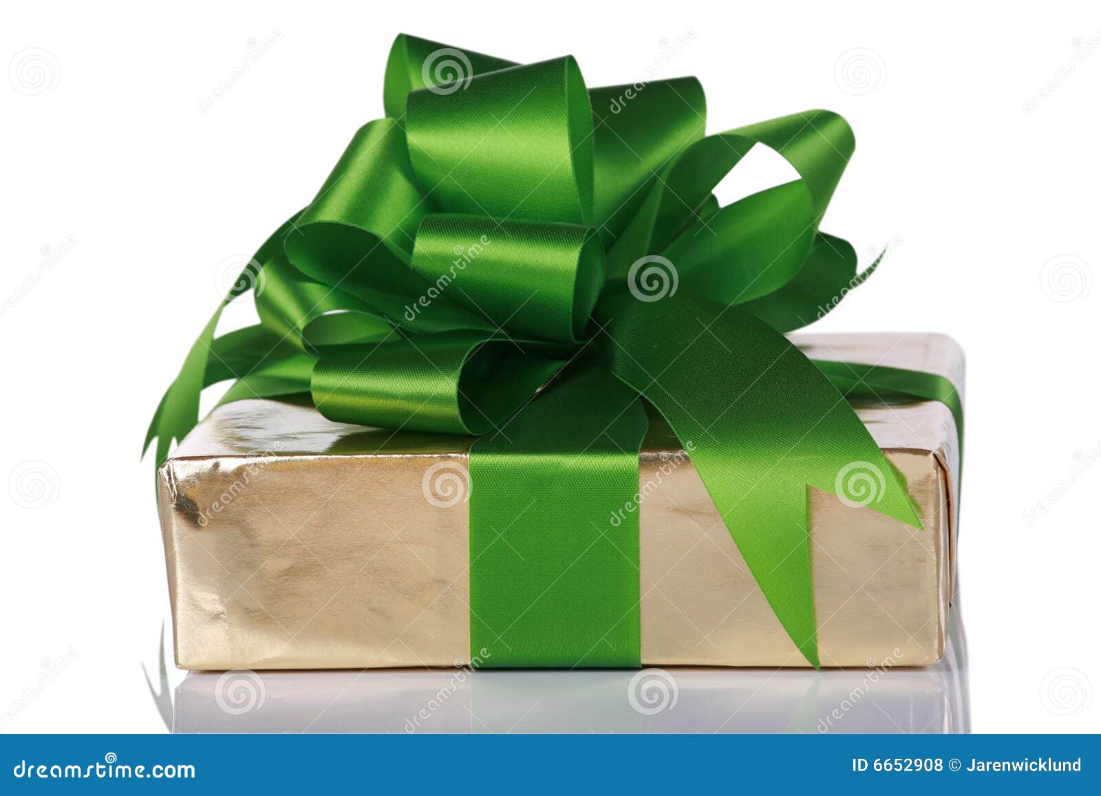 Gold Present Wrapped with Green Ribbons Stock Photo - Image of ...