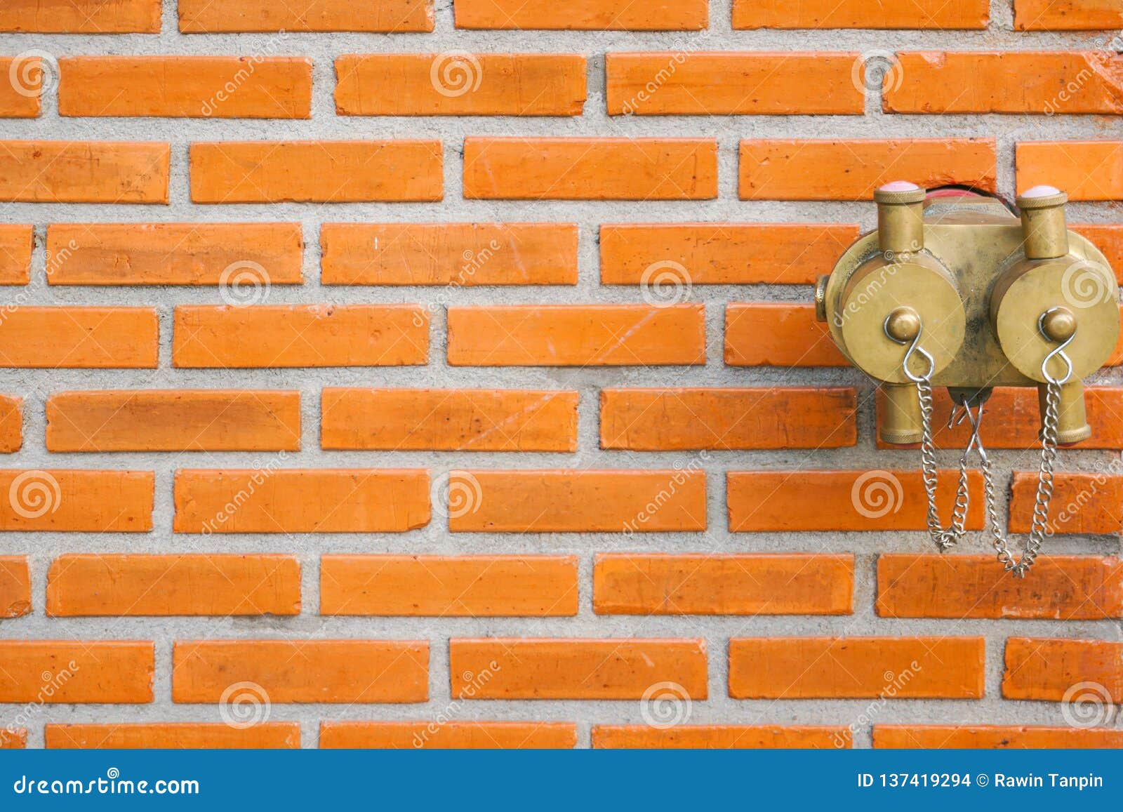 Gold Red Fire Hydrant in Brick Wall at Modern Building Stock Photo ...