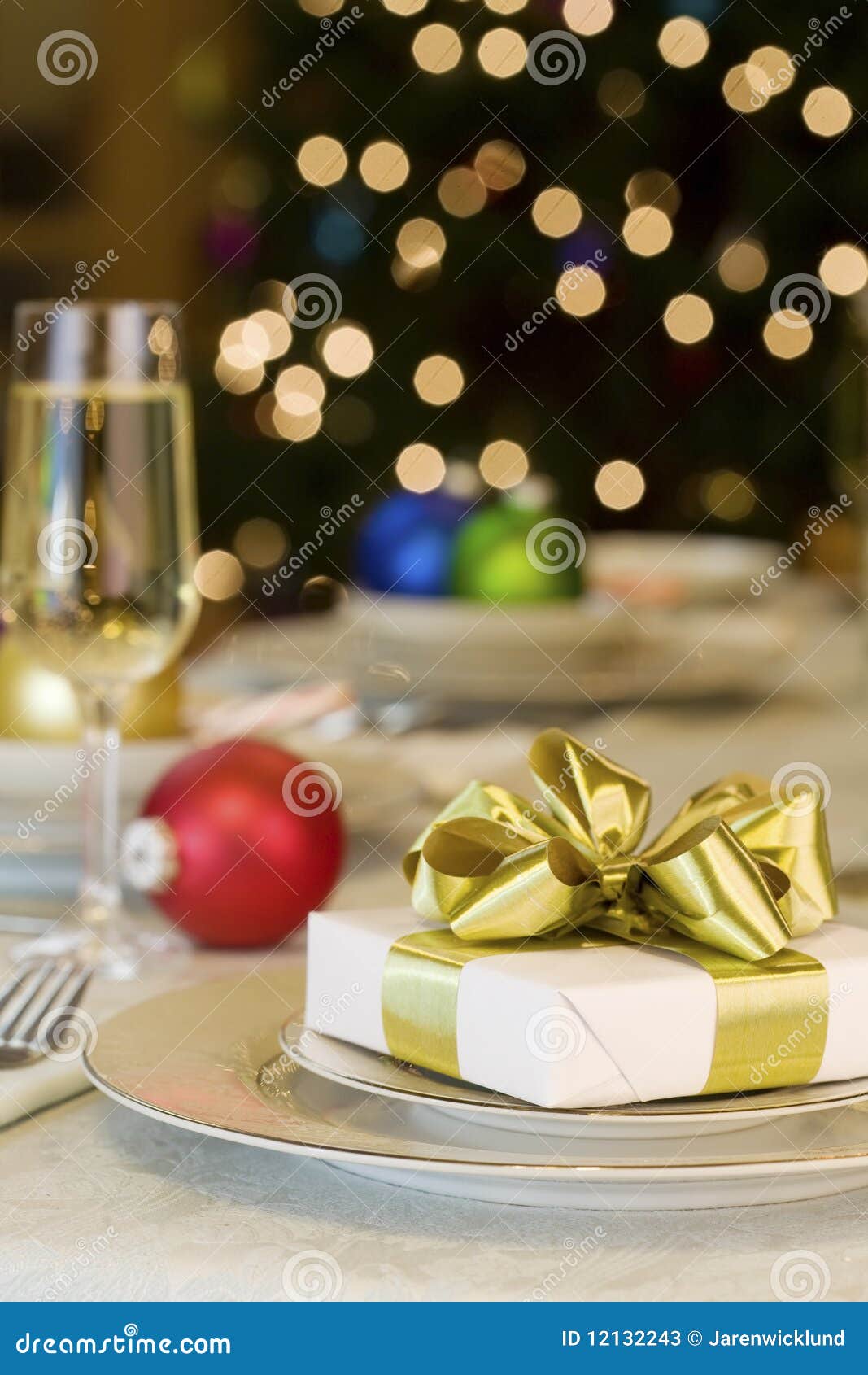 Gold ribbon gift on table stock image. Image of beautiful - 12132243