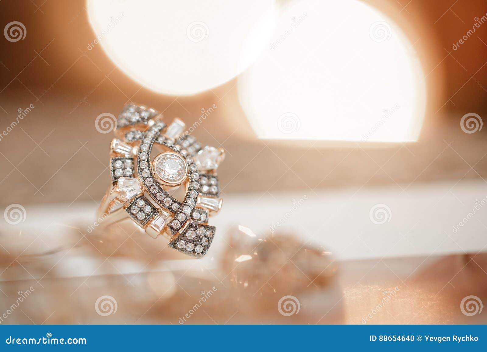 Gold Ring with Diamond on Soft Beige Background Stock Photo - Image of ...