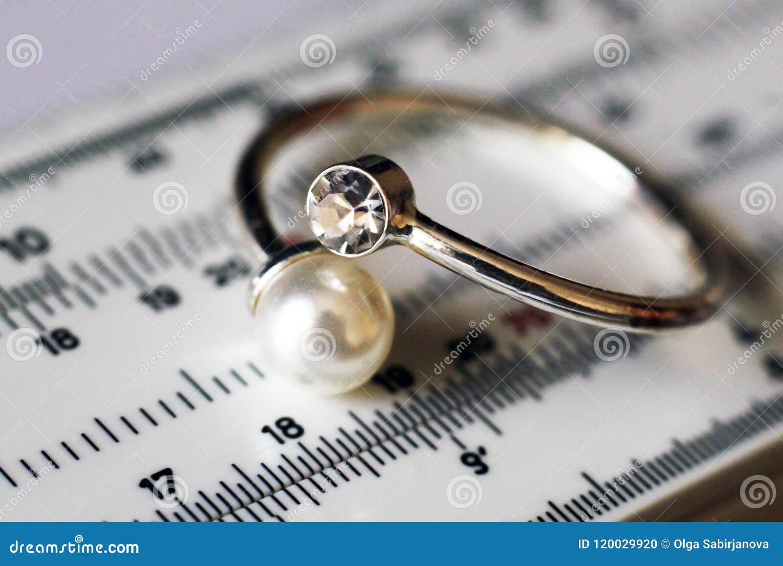 Gold Ring with Diamonds and a Measuring Instrument, the Value of ...