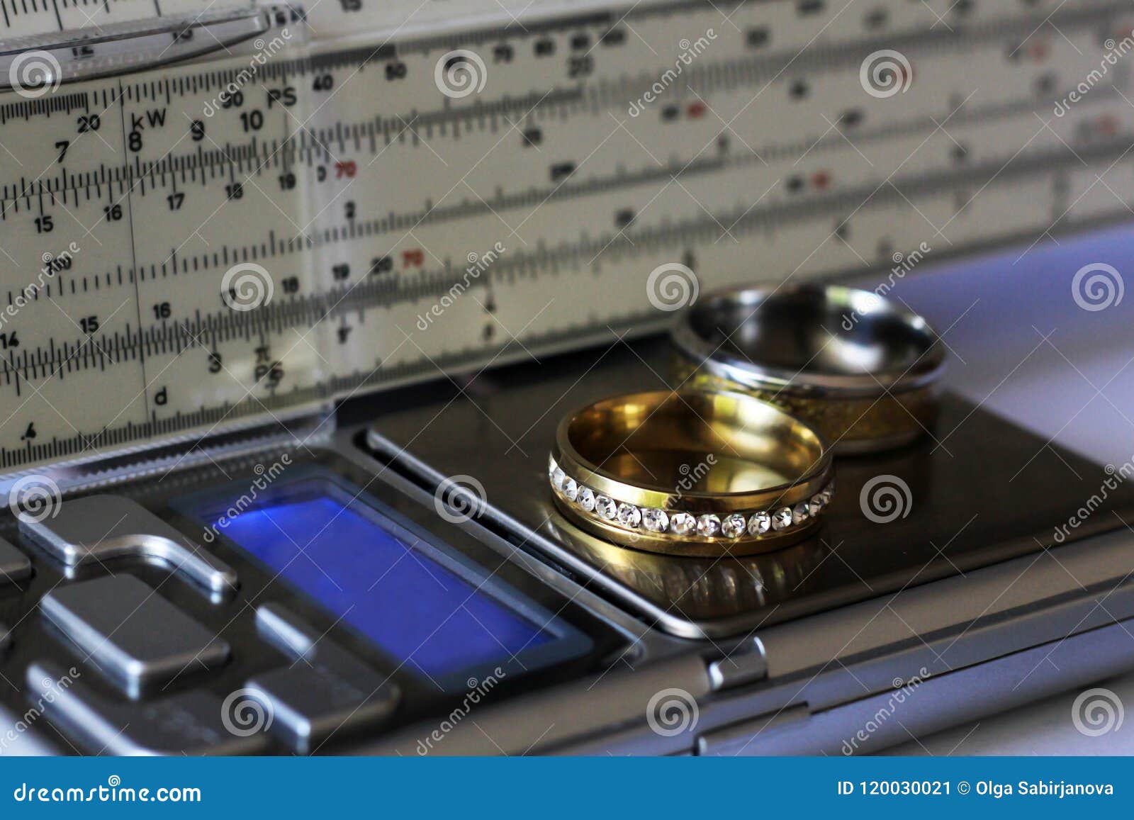 Gold Ring with Diamonds and a Measuring Instrument, the Value of ...