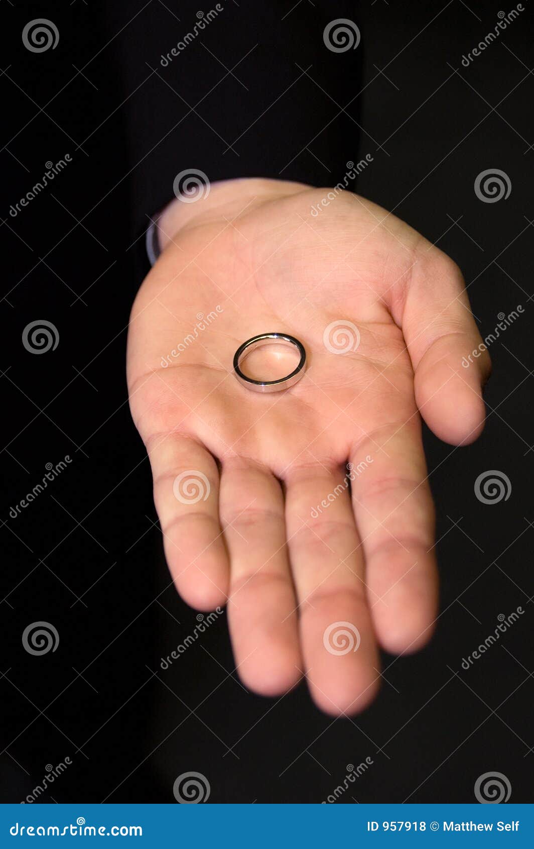 Gold ring in hand stock photo. Image of band, wedlock, ceremony - 957918