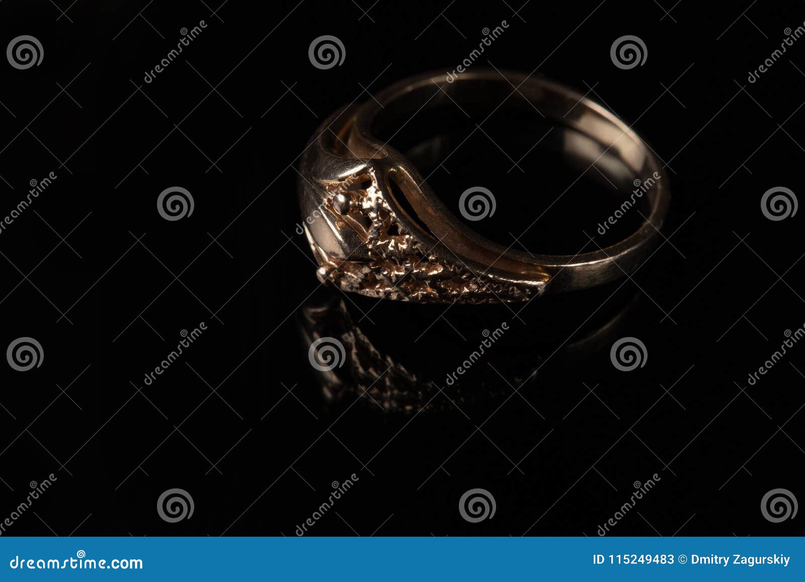 Gold Ring with a Pattern on a Black Background Stock Image - Image of ...